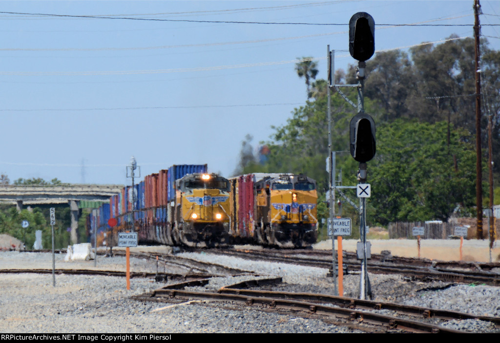 UP 8478 EB Passing WB Pusher